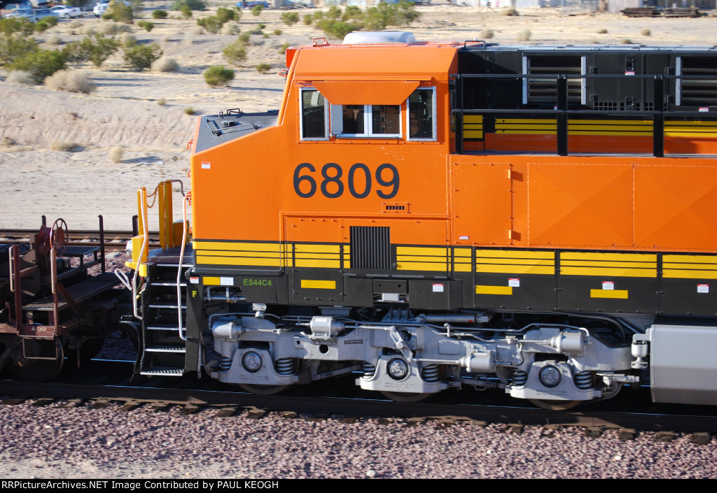 A side shot of the cab of BNSF 6809 as she heads into the yard for a crewchange and continue ...